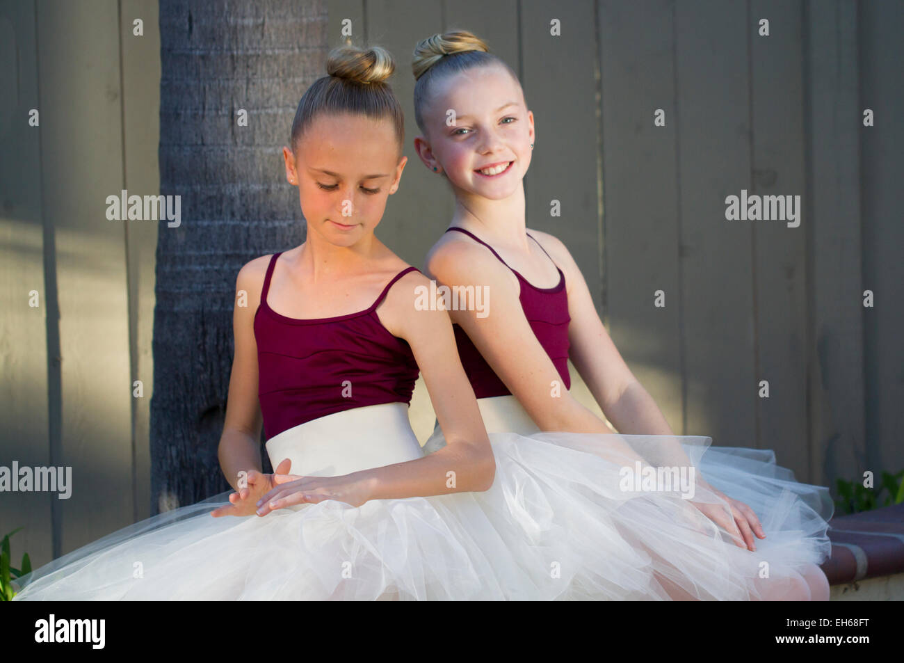 Two cute ballerinas getting ready for their recital Stock Photo - Alamy