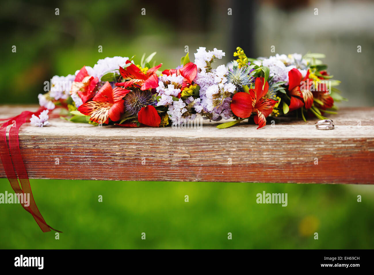 Flower wreath decoration with wedding rings. Selective focus Stock ...