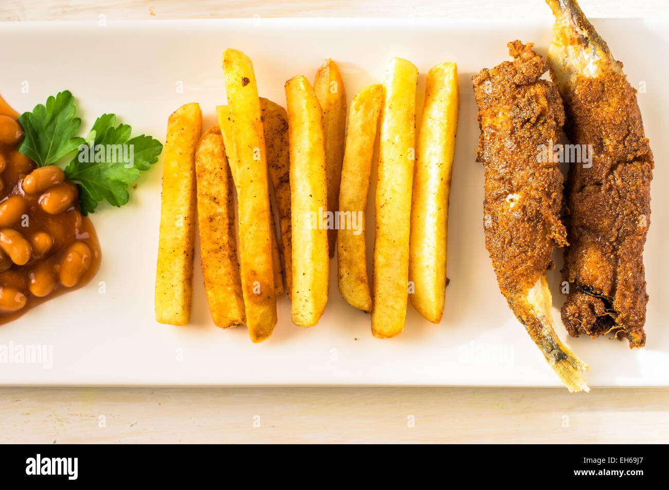 Fish and chips on a plate. Appetizer with seafood top view Stock Photo ...