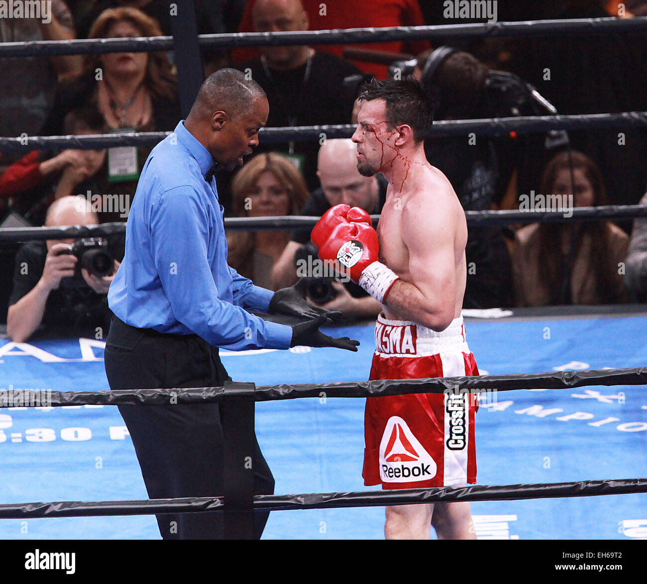 Las Vegas, Nevada, USA. 7th Mar, 2015. A bloodied Robert Guerrero is ...