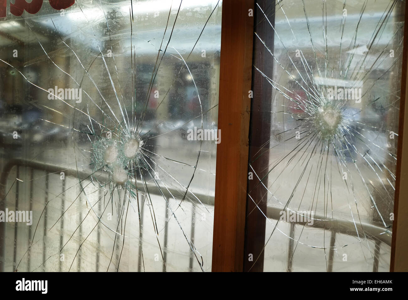Broken armored glass in jewelry shop window Stock Photo - Alamy