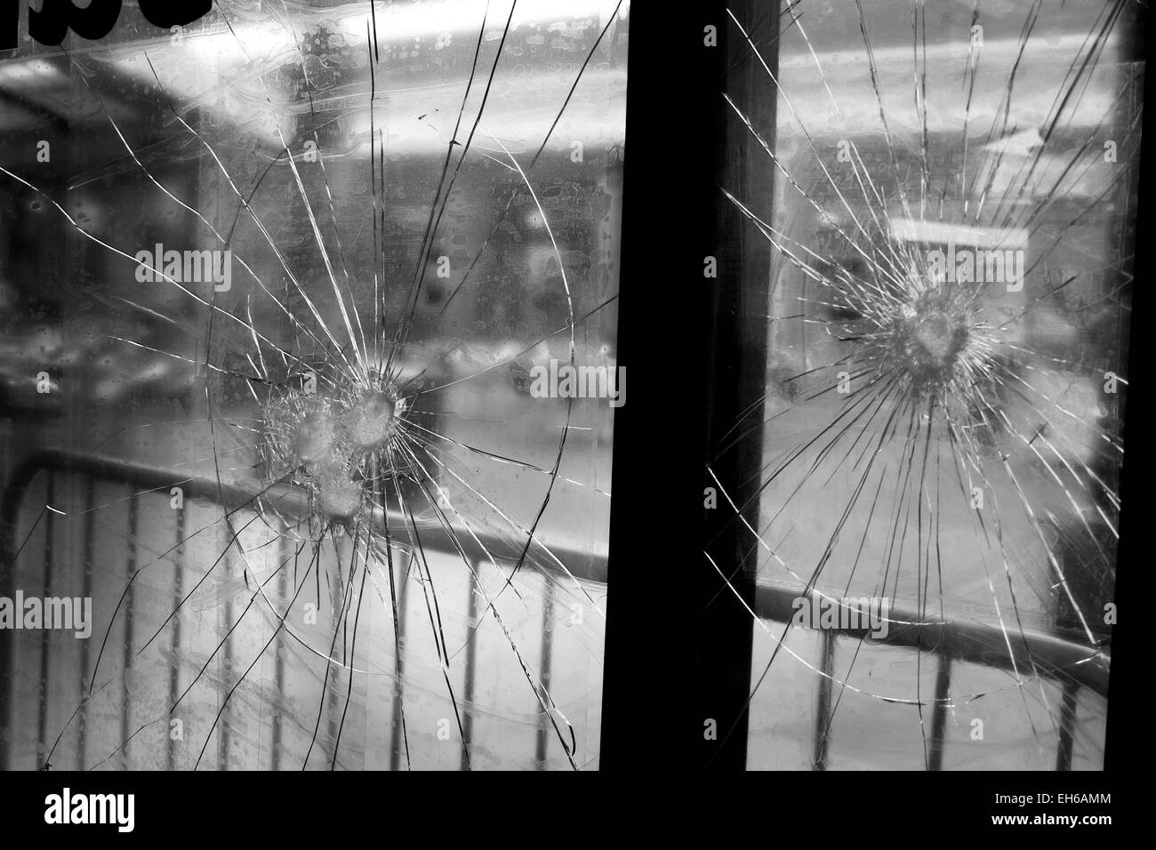 Broken armored glass in jewelry shop window Stock Photo - Alamy