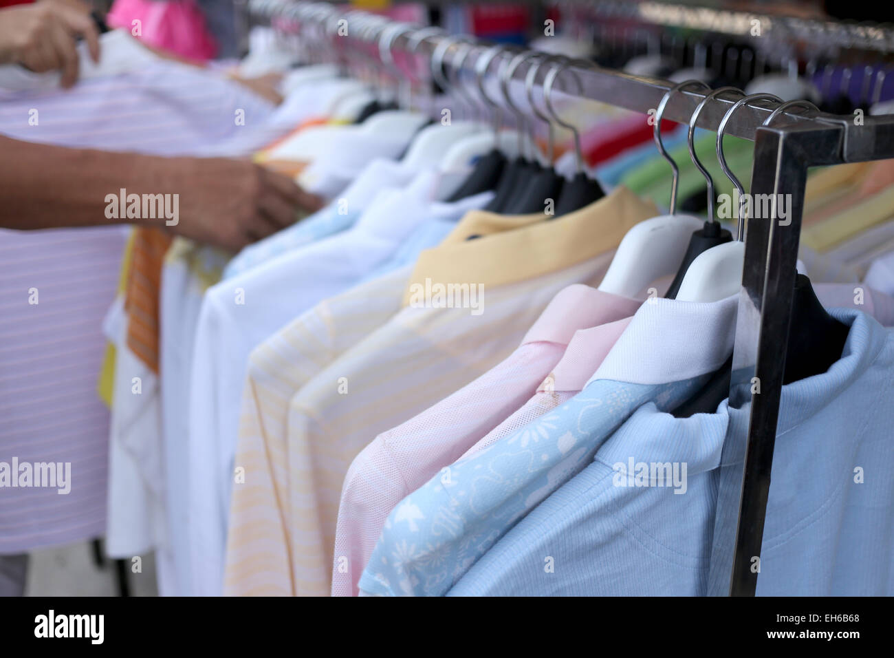 Colorful clothes hanging on clothesline Stock Photo - Alamy