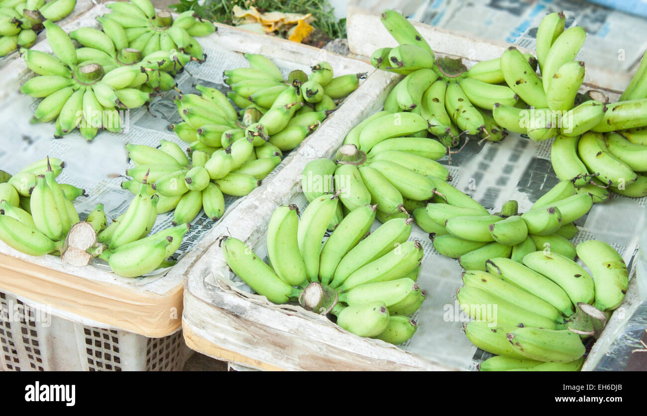 A lot of green bananas, at a market Stock Photo - Alamy
