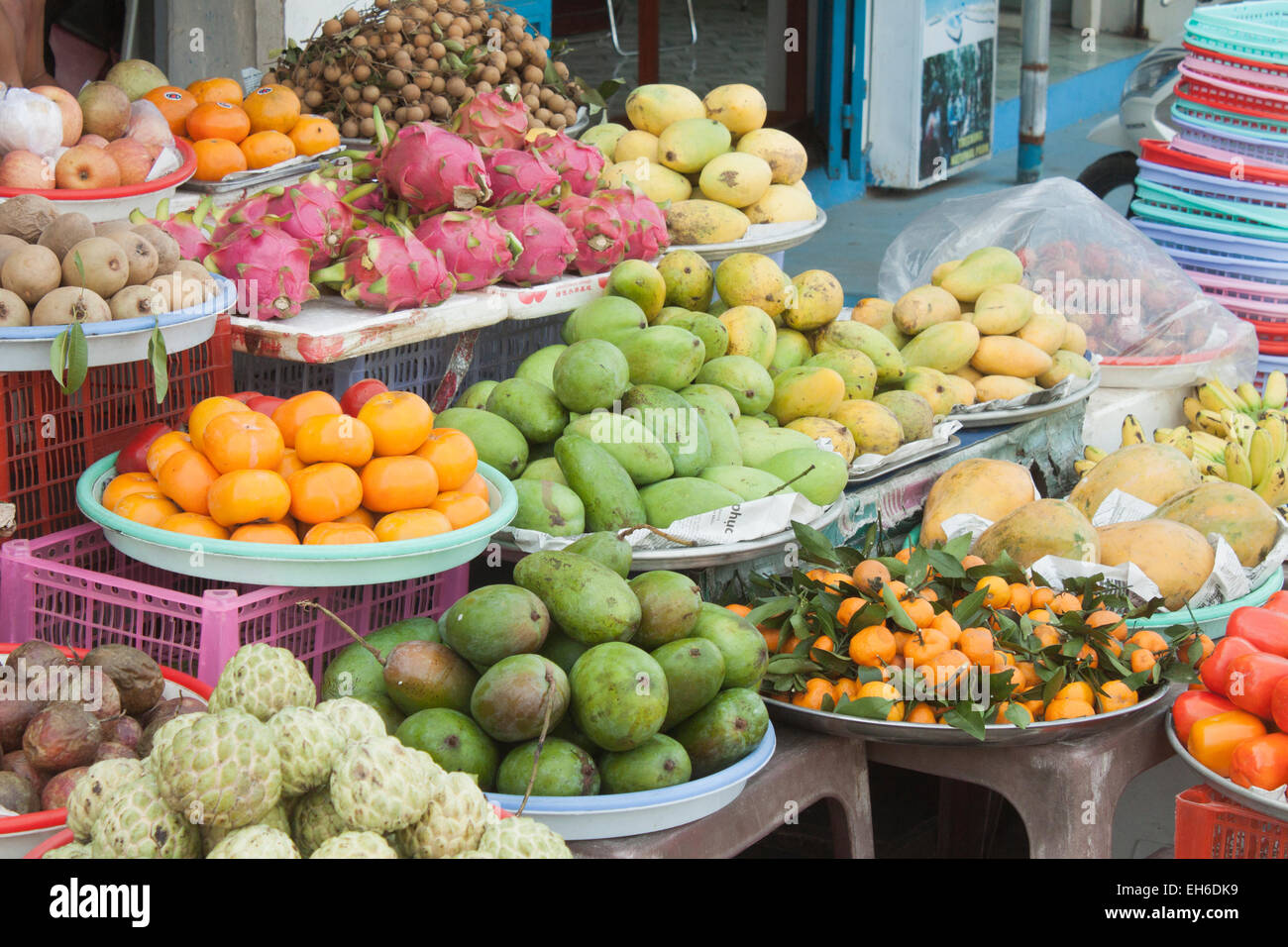 A bunch of fresh, colorful fruits, at a market Stock Photo - Alamy