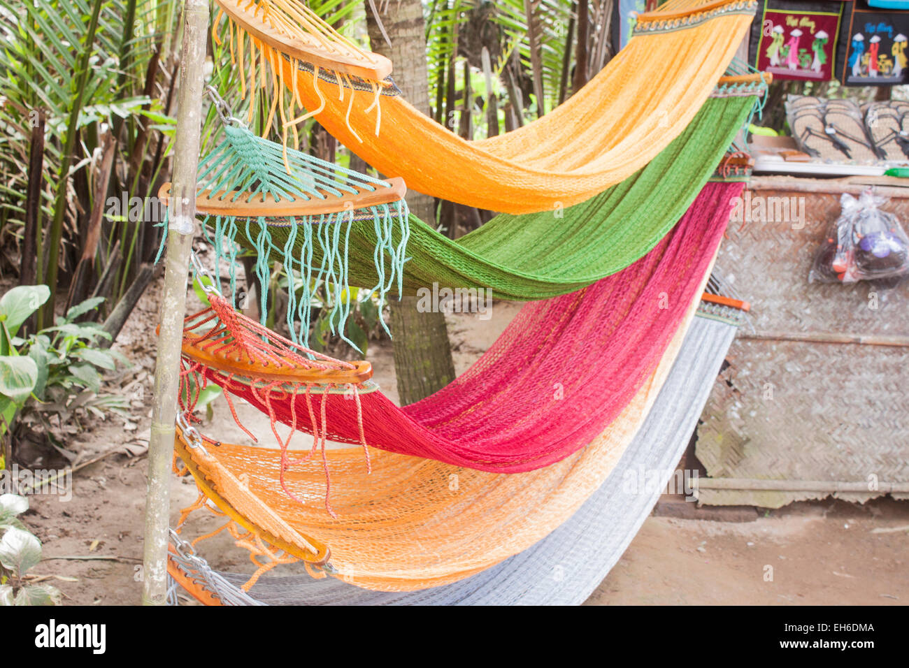 A bunch of different color hammock, at a store Stock Photo - Alamy