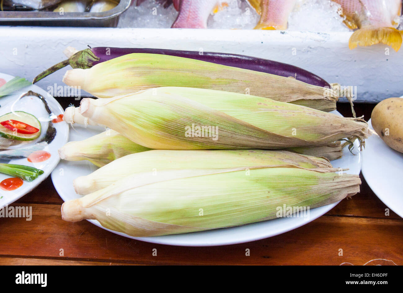 A bunch of closed sweetcorn, at a market Stock Photo - Alamy