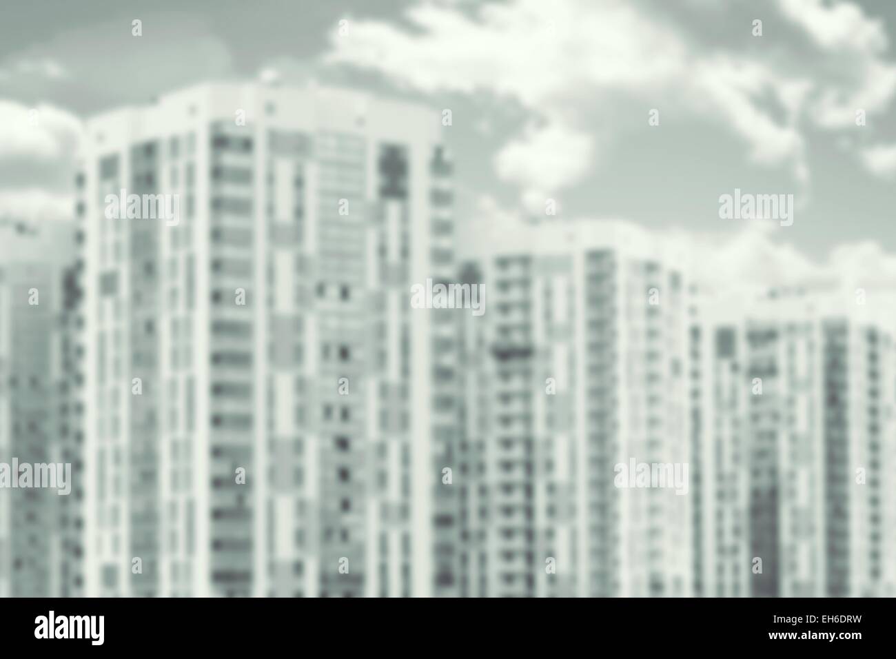 Background blurred building with sky, clouds Stock Photo - Alamy