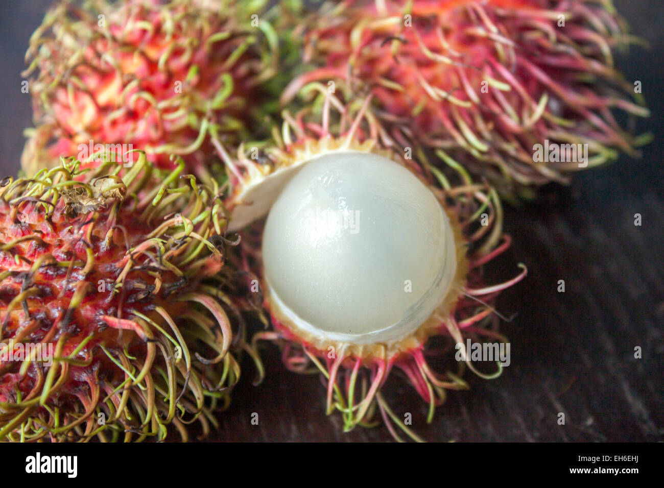A lot of rambutan, at a table, in Thailand Stock Photo - Alamy