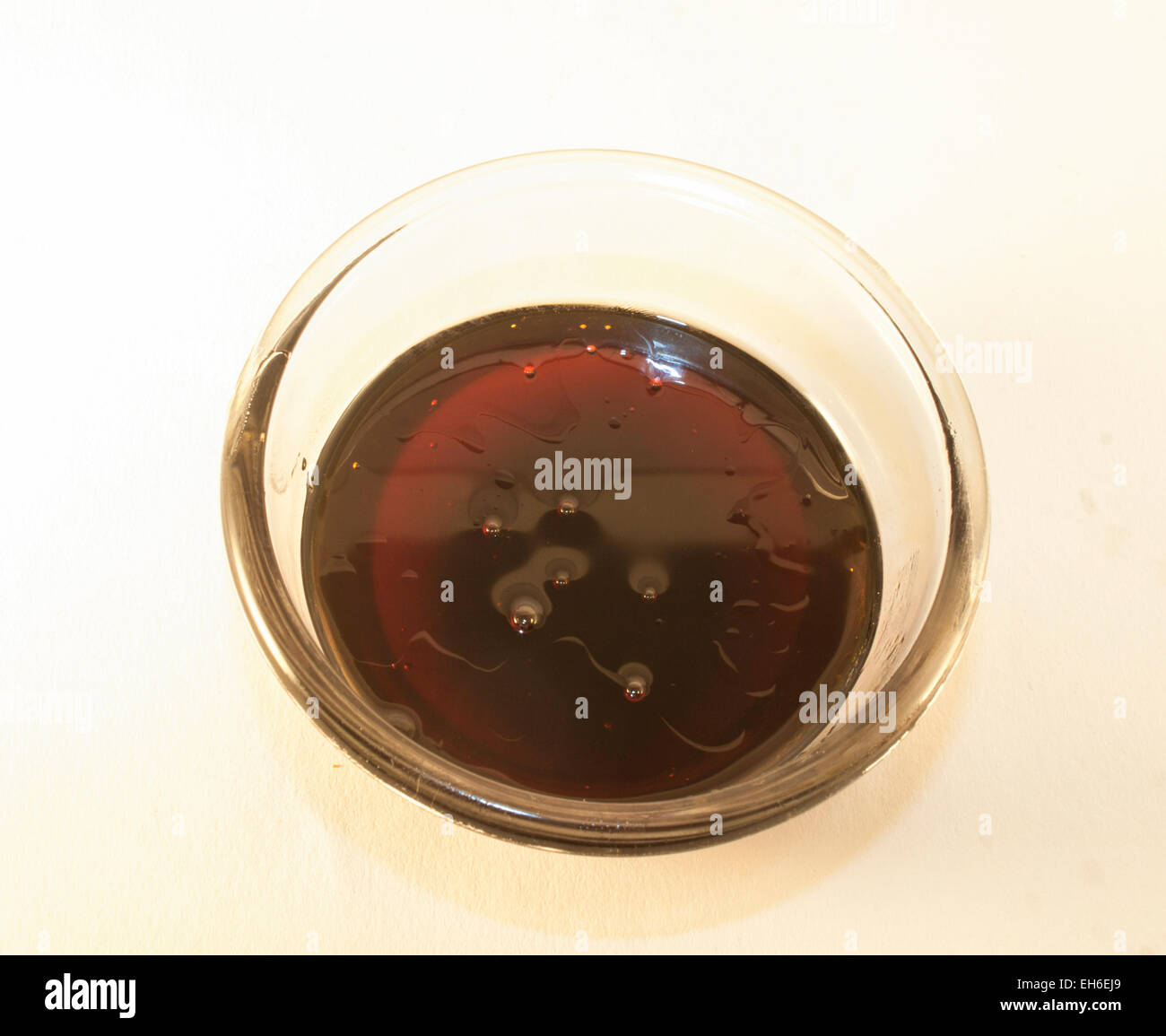 Brown, sugar syrup, isolated on white background Stock Photo - Alamy