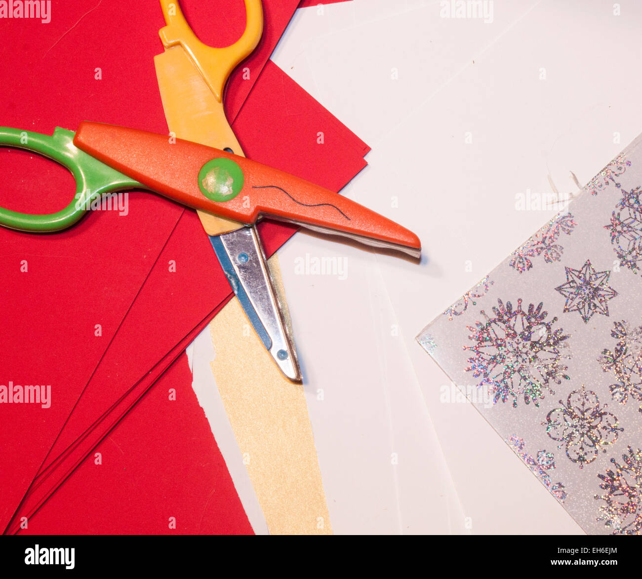 Hobby craft, sissors, red and shiny paper Stock Photo - Alamy