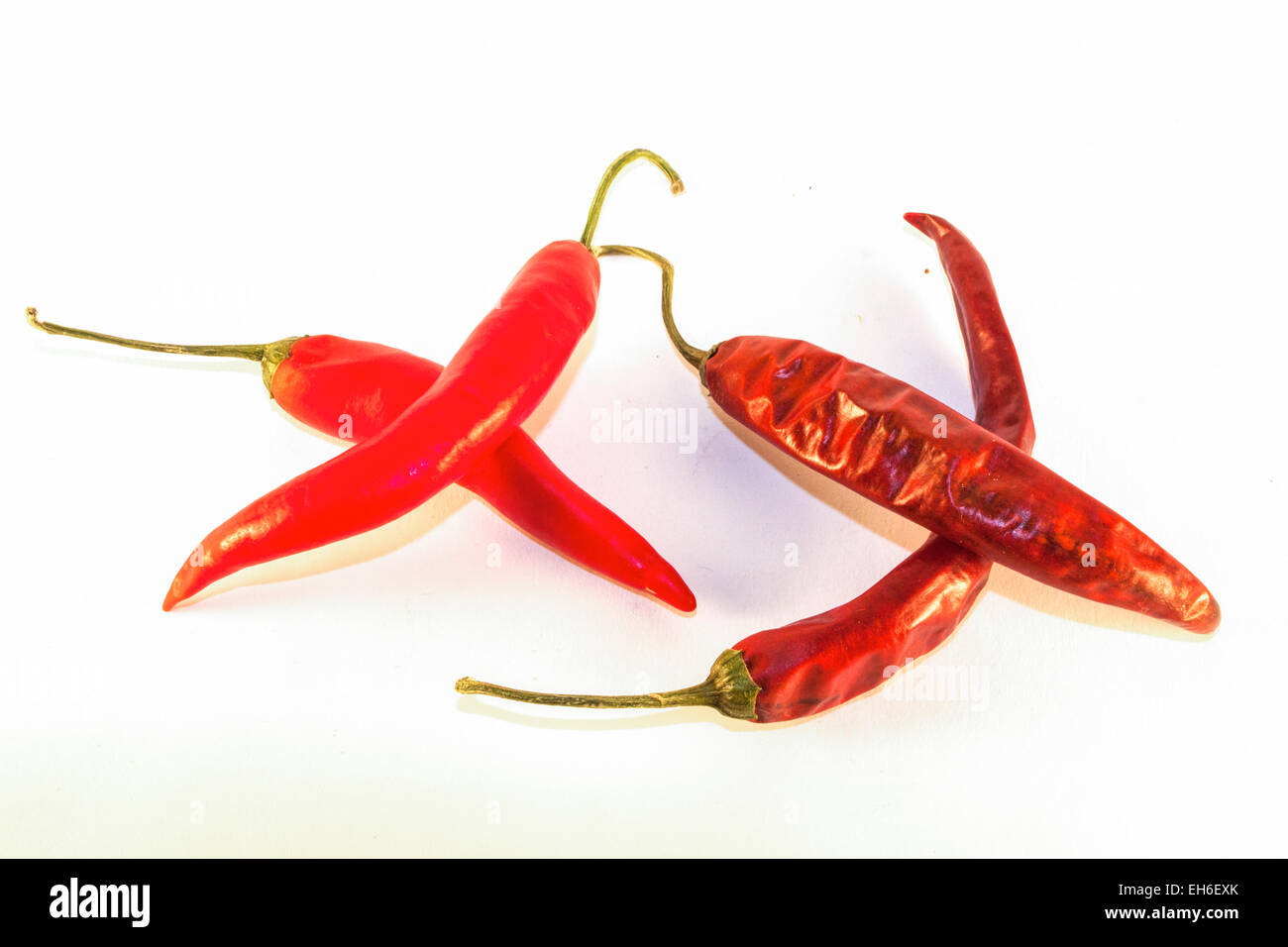 Dry and fresh chili, isolated on white background Stock Photo - Alamy