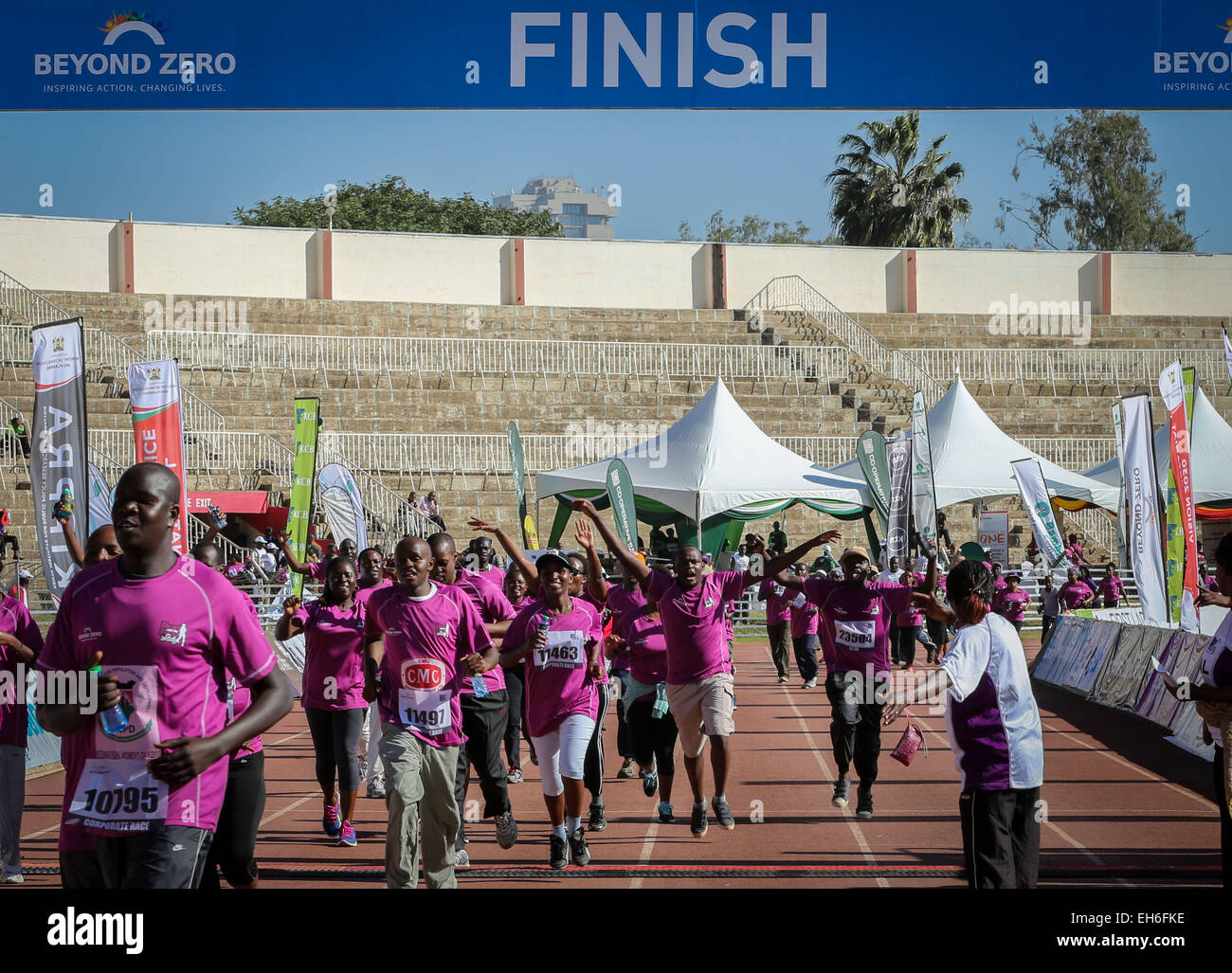 Nairobi, Kenya. 8th Mar, 2015. Runners celebrate at the finish point ...