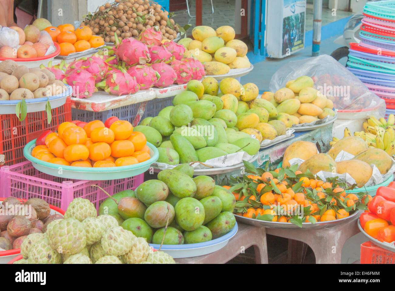 A bunch of fresh, colorful fruits, at a market Stock Photo - Alamy