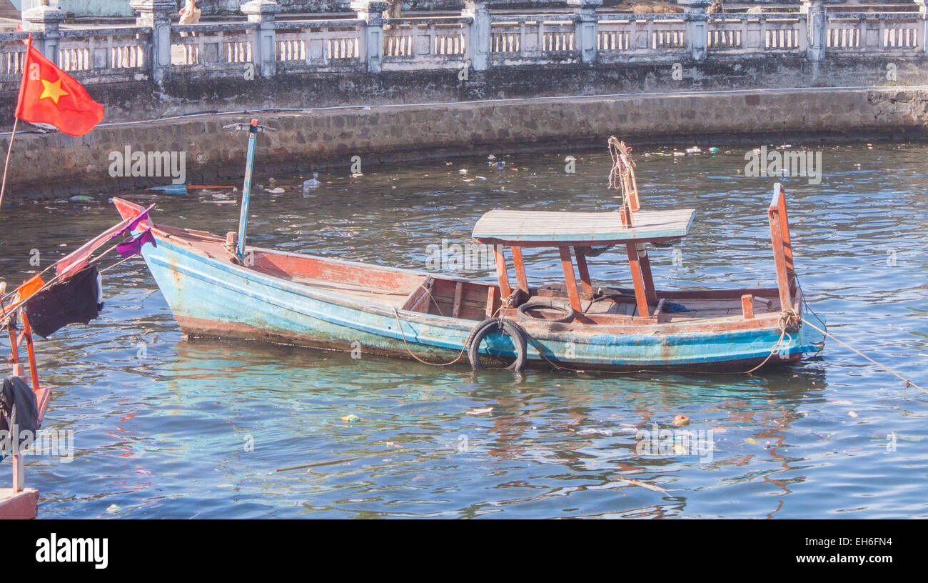 A lonely fish boat at the harbor of Duong dong, in Vietnam Stock Photo ...