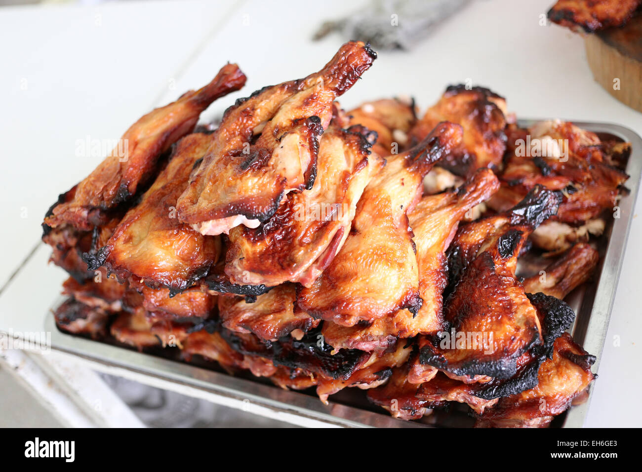 Grilled chicken on the foods table for lunch Stock Photo - Alamy
