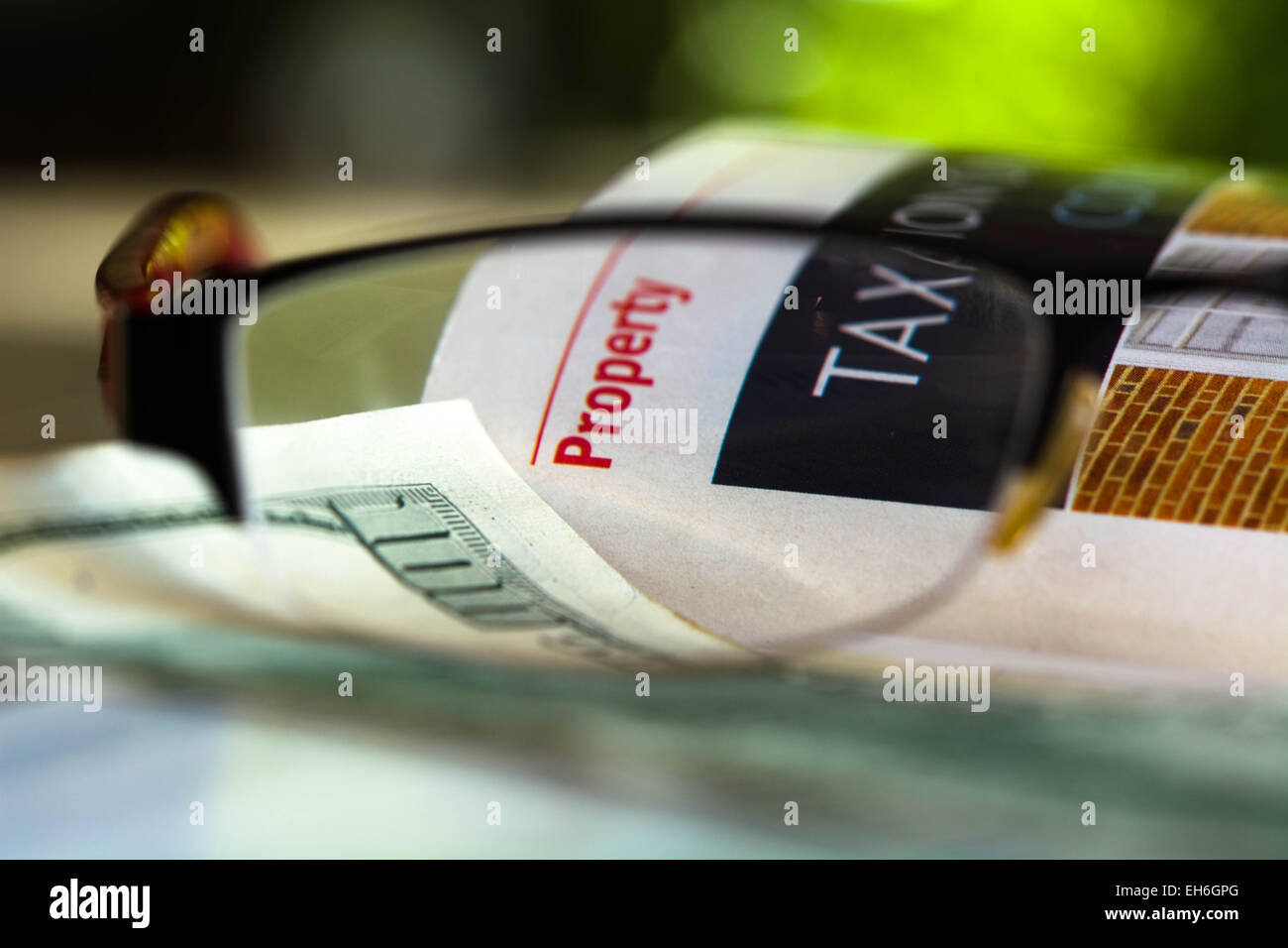 One hundred dollar bill on financial paper Stock Photo - Alamy