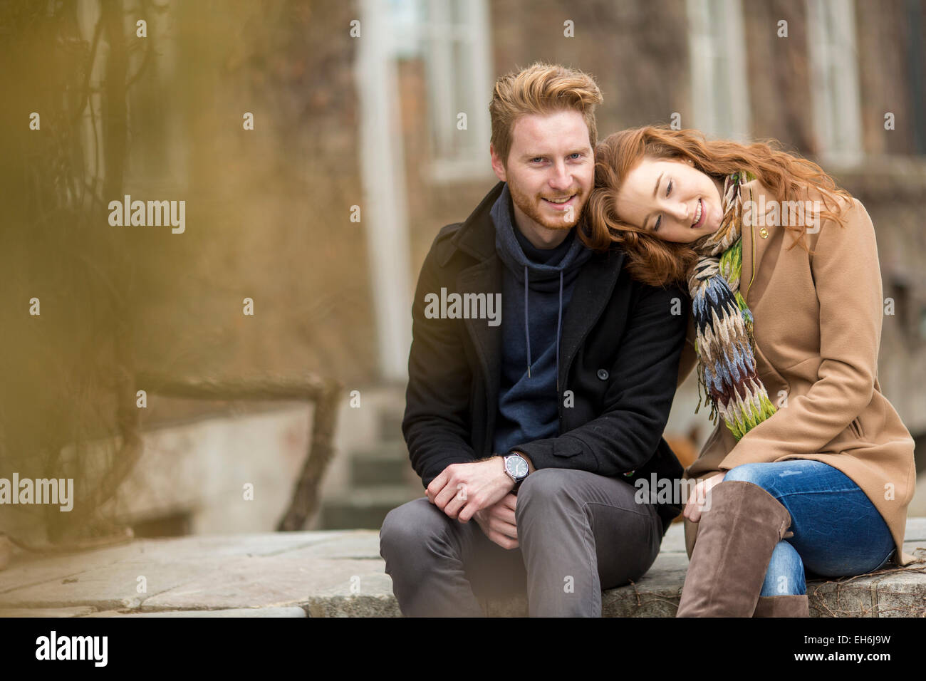 Young red hair couple at autumn park Stock Photo - Alamy