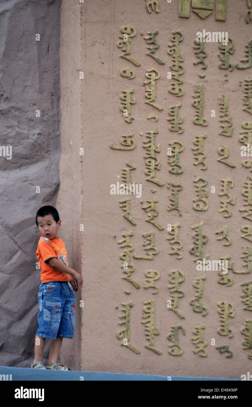 Ulaanbaatar, Sukhbaatar Square, Boy Next to Mongolian Script Stock ...