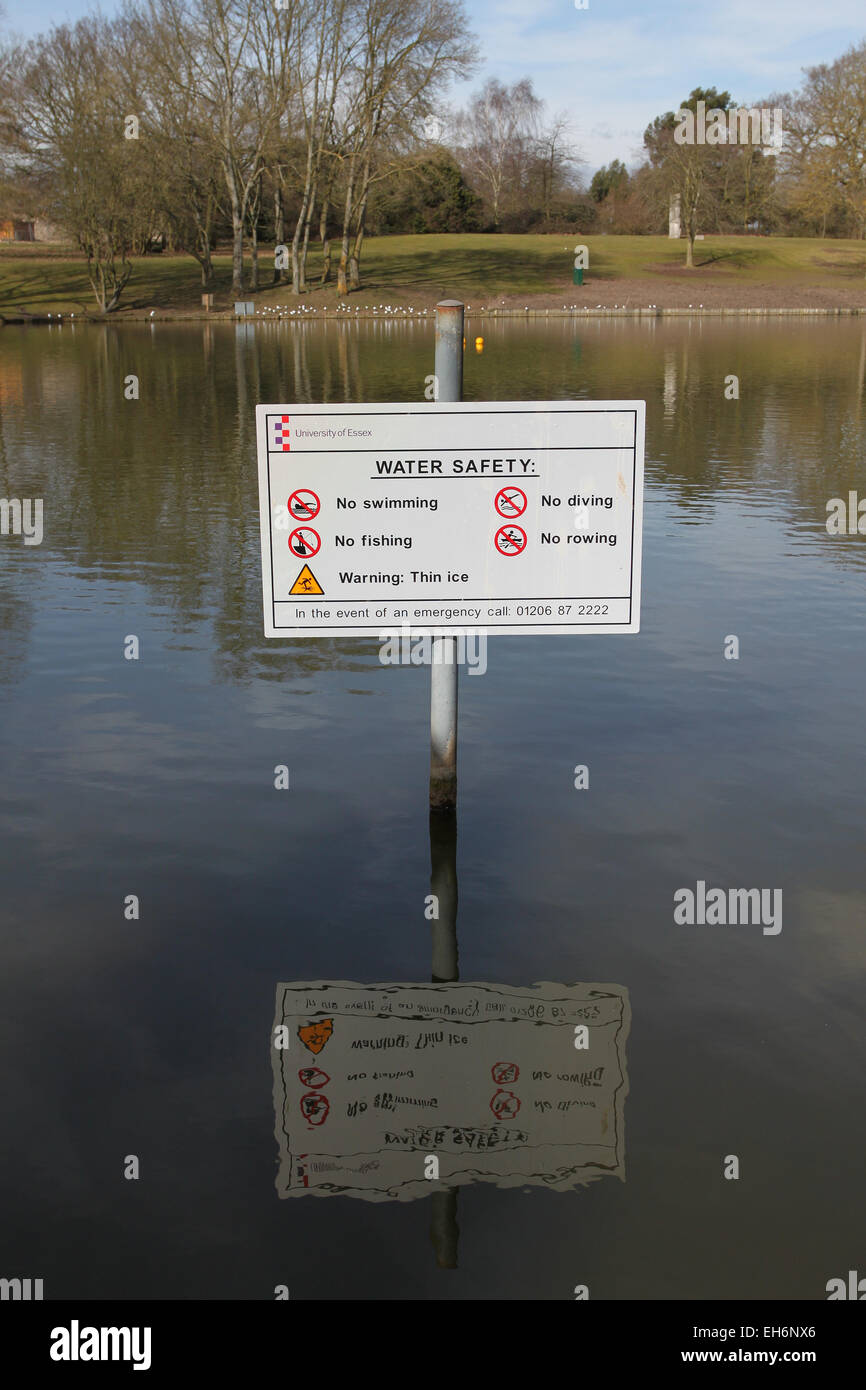 Water safety sign in lake at University of Essex campus, Wivenhoe Park ...