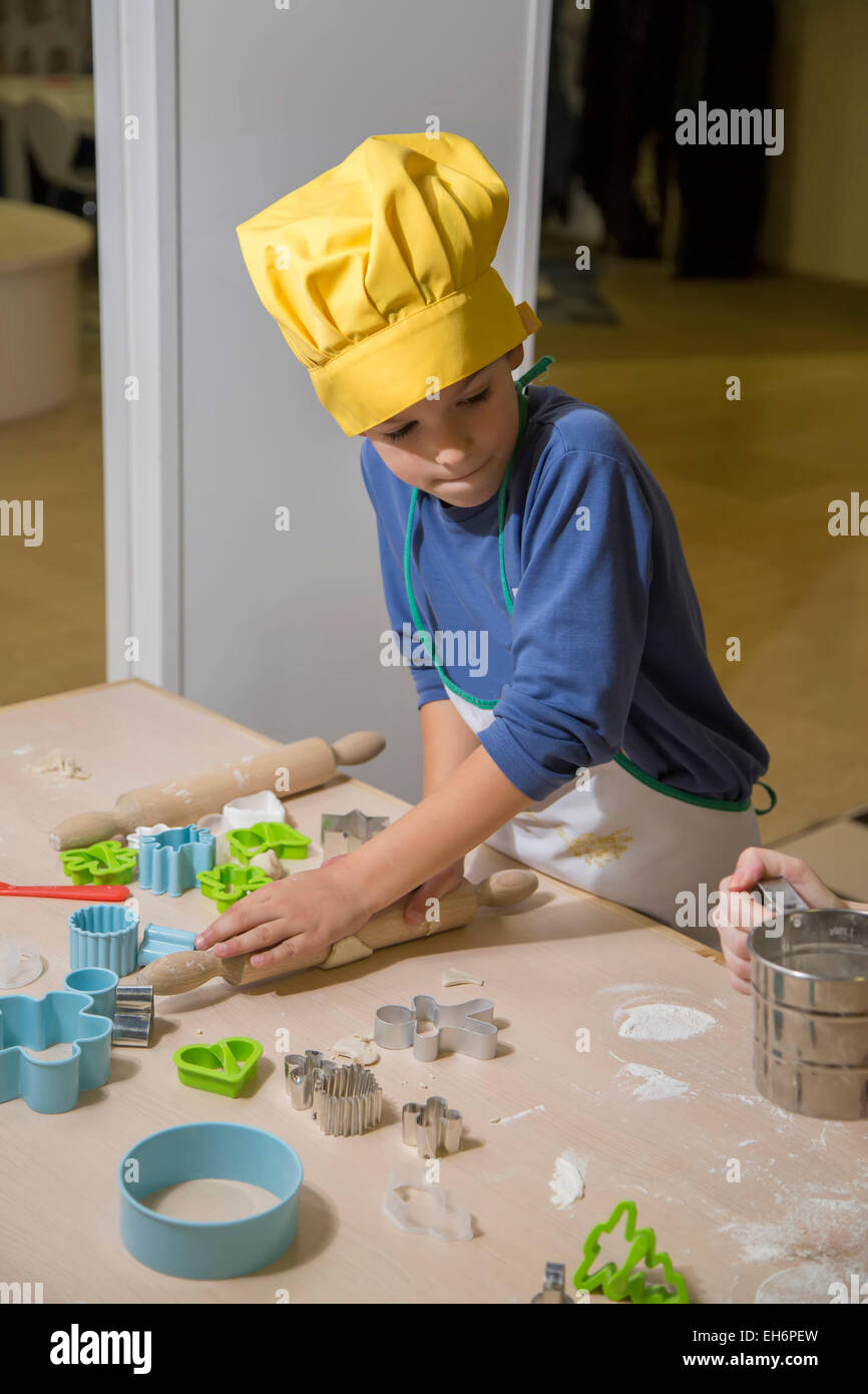 Boy making cakes in the kichen Stock Photo - Alamy