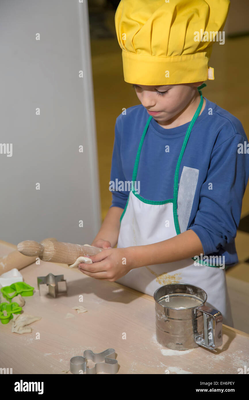 Boy making cakes in the kichen Stock Photo - Alamy