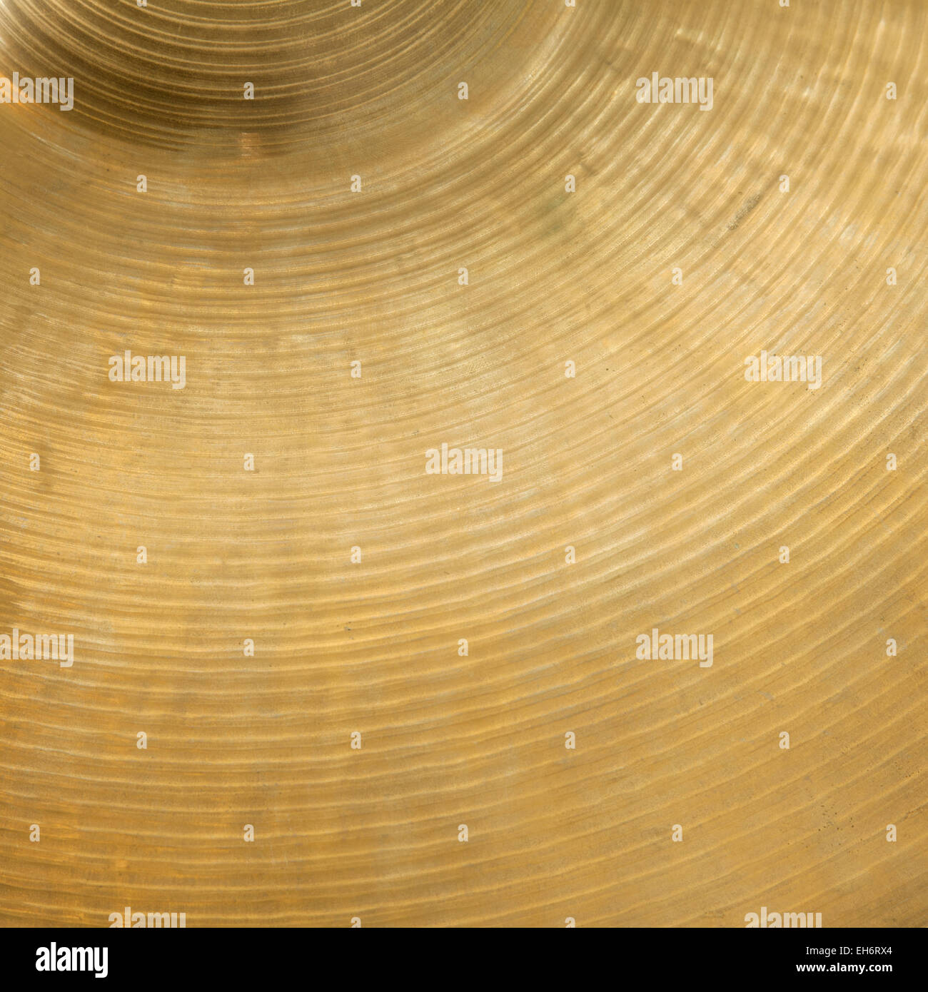 closeup of gold colored cymbal on square picture Stock Photo - Alamy