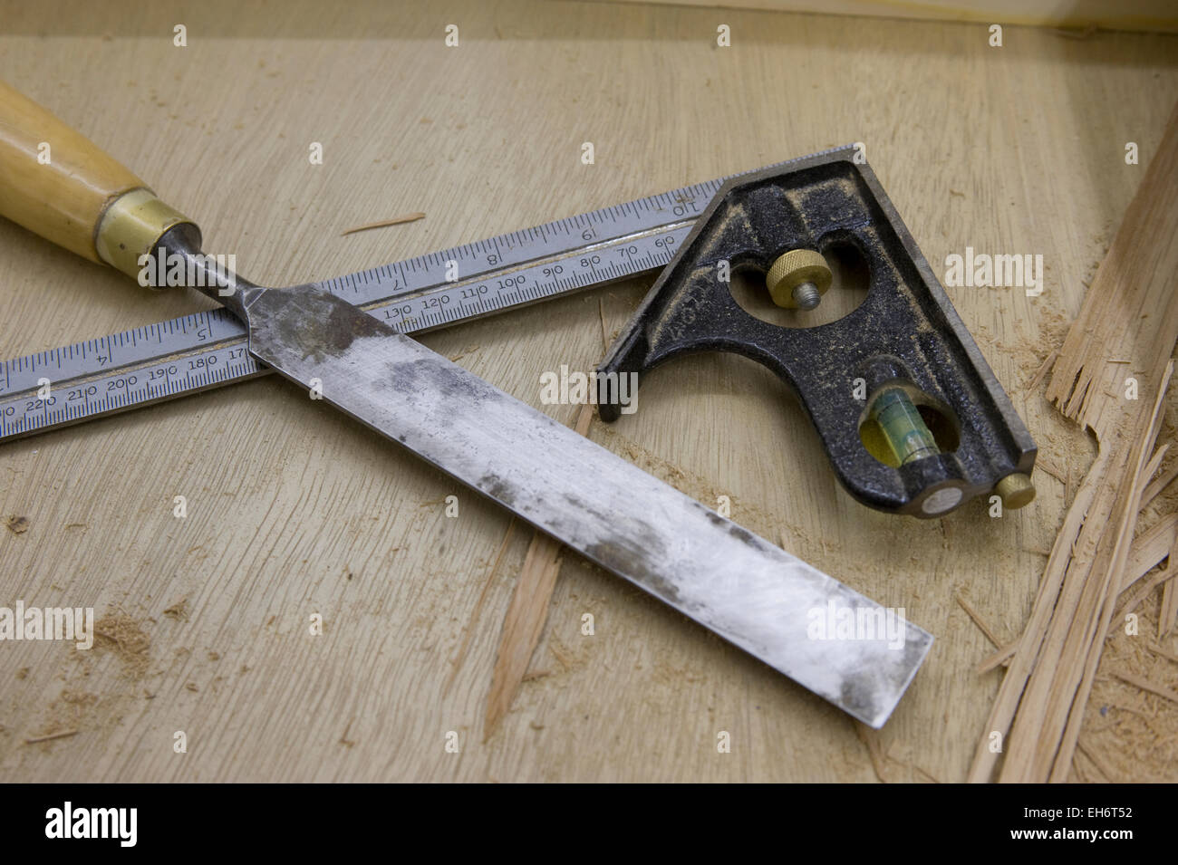 craftsmen work in a woodworking factory preparing high quality ...