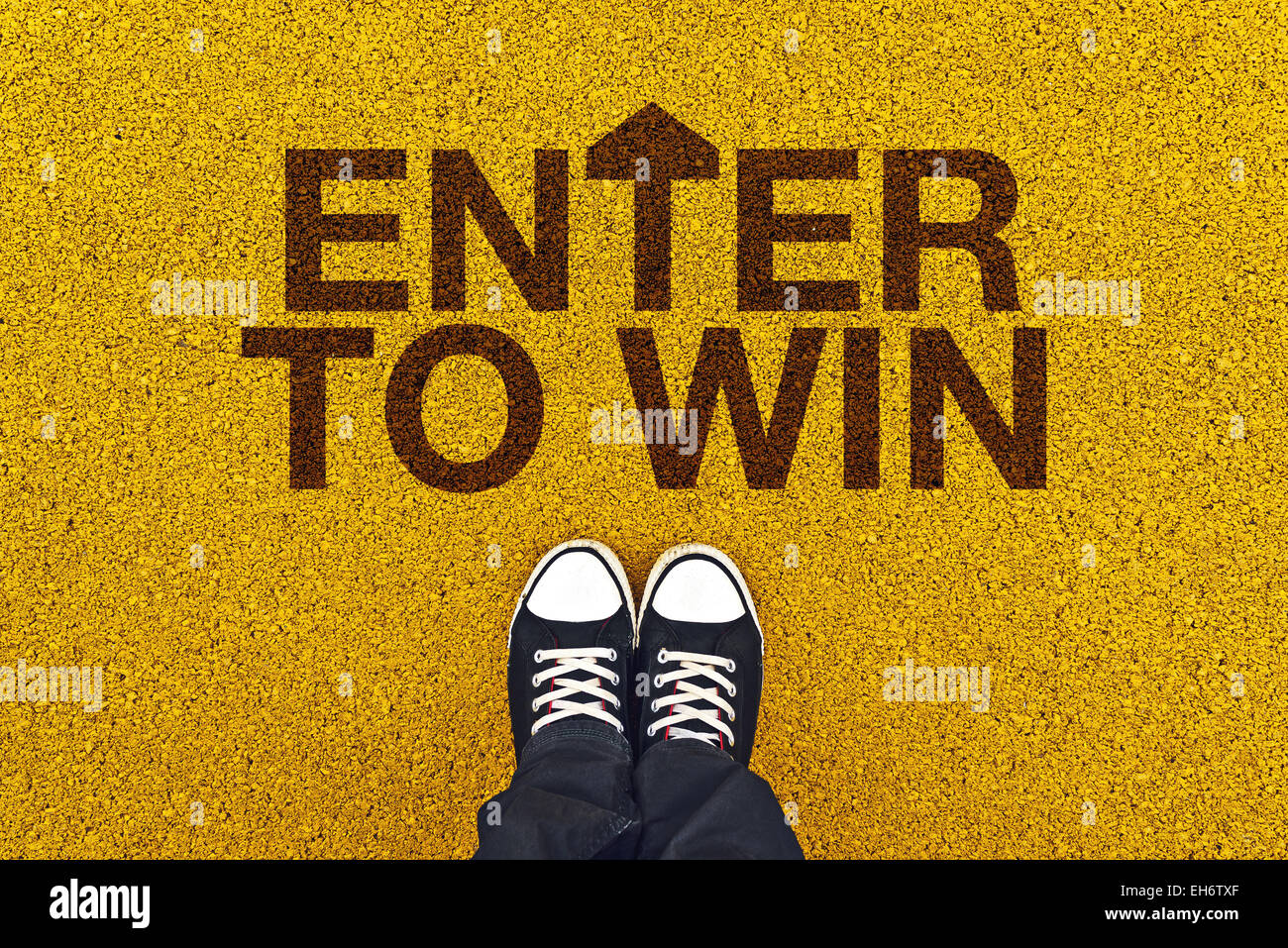 Enter To Win on Asphalt Road, Man standing Above the Title Ready to ...