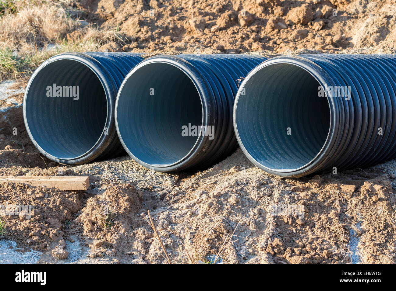 drain pipes buried under ground Stock Photo - Alamy