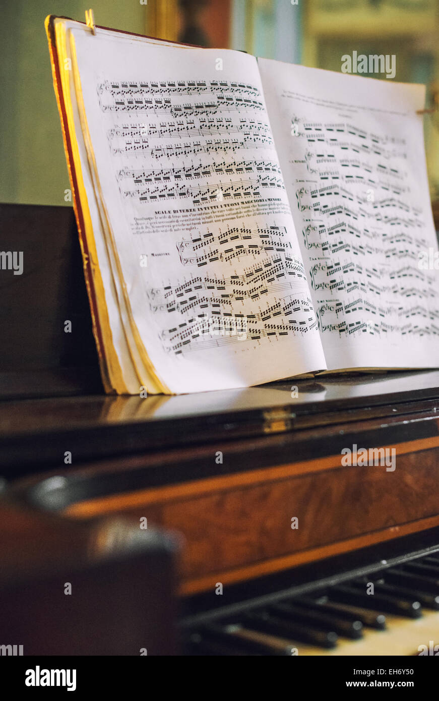Vintage photo of old piano with notes Stock Photo - Alamy