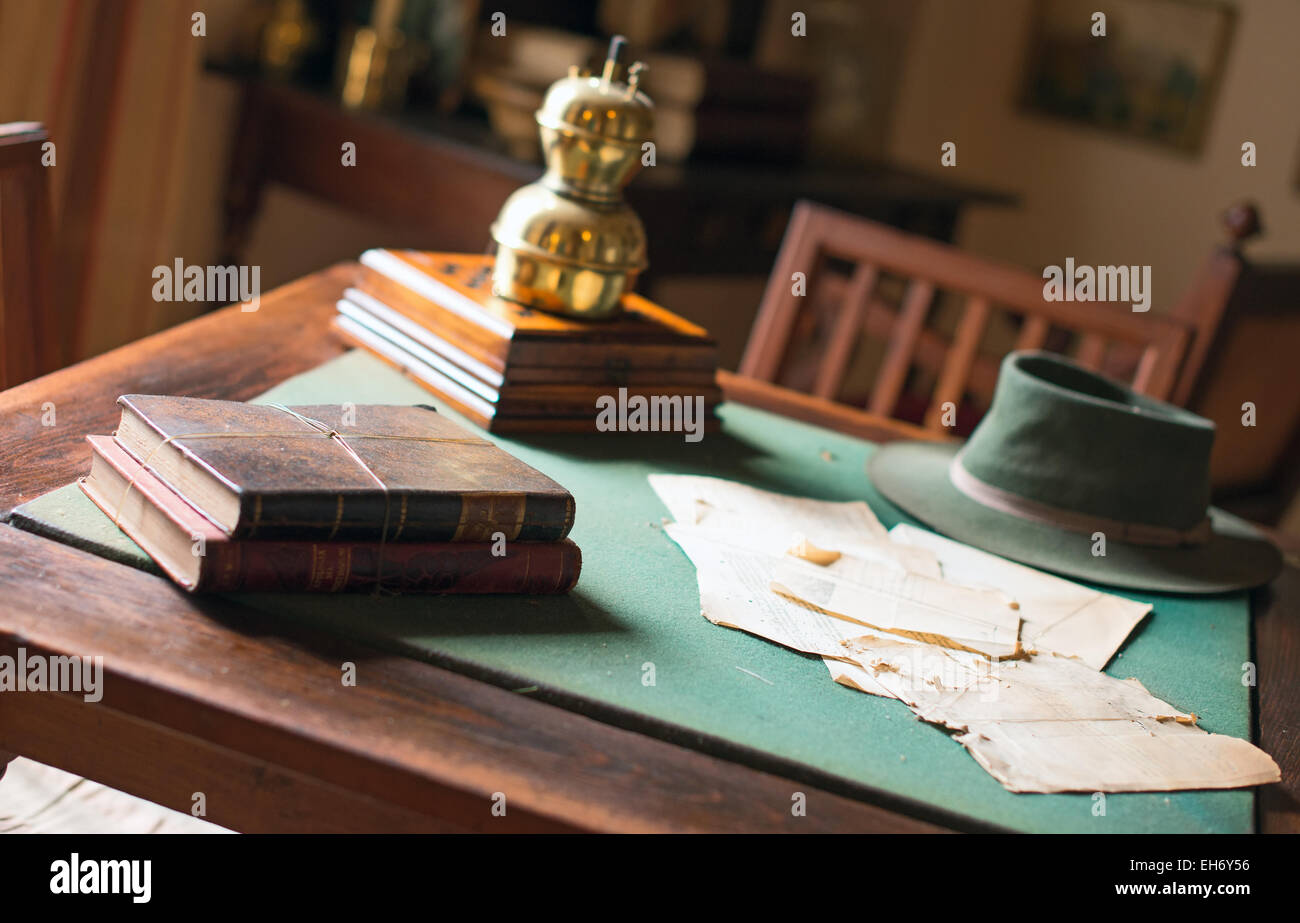 Old books lying on the dusty table Stock Photo - Alamy
