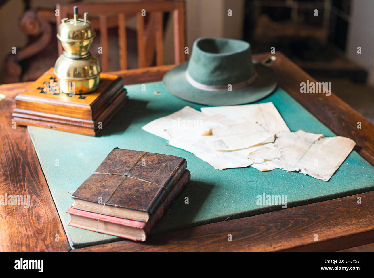 Old books lying on the dusty table Stock Photo - Alamy