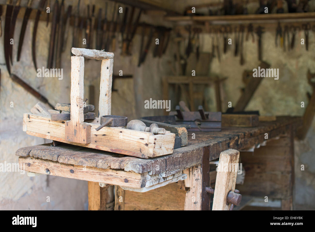 Room with pile of vintage hand tools Stock Photo - Alamy