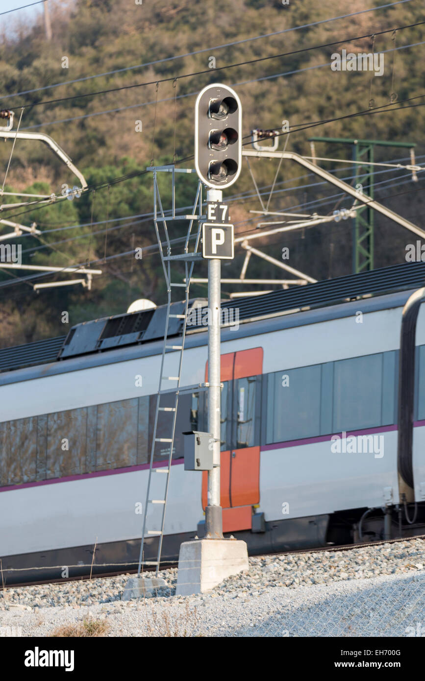 train passing through the traffic light Stock Photo - Alamy