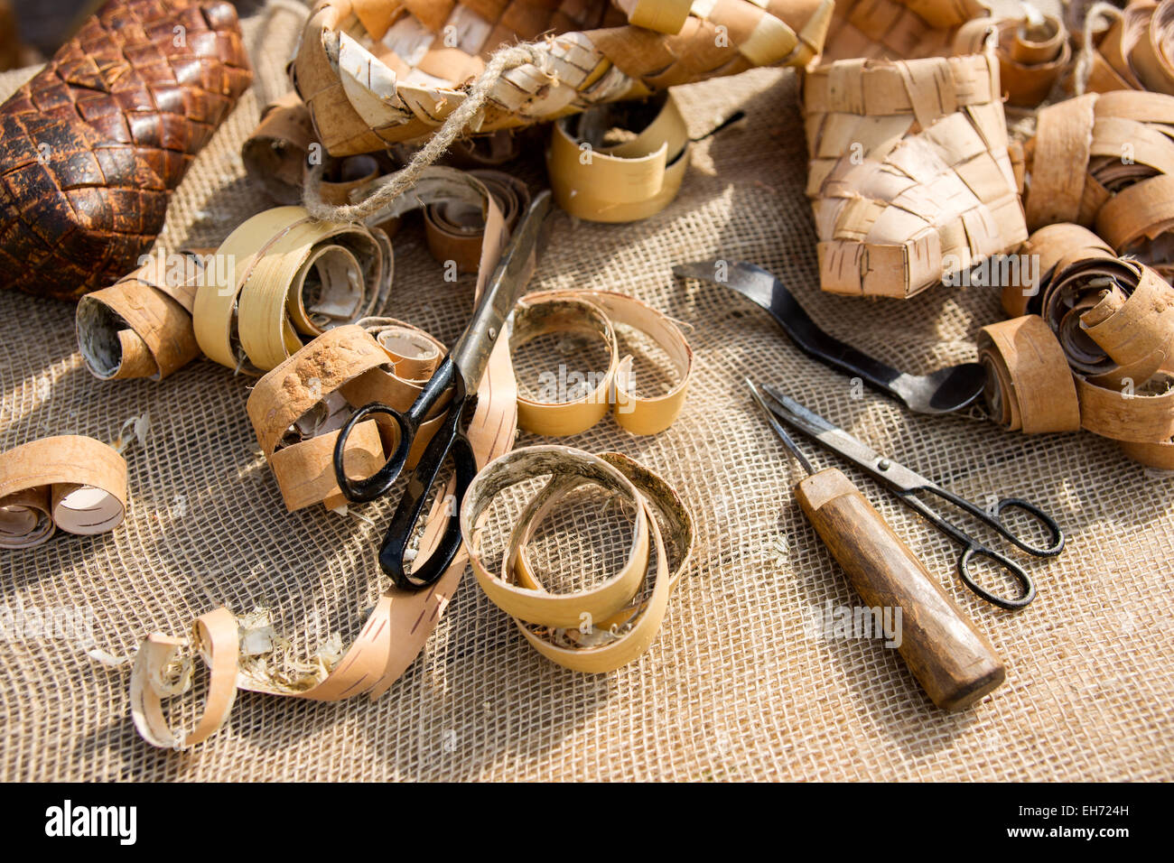 Closeup view of tools, instruments and work in progress of bast shoes ...