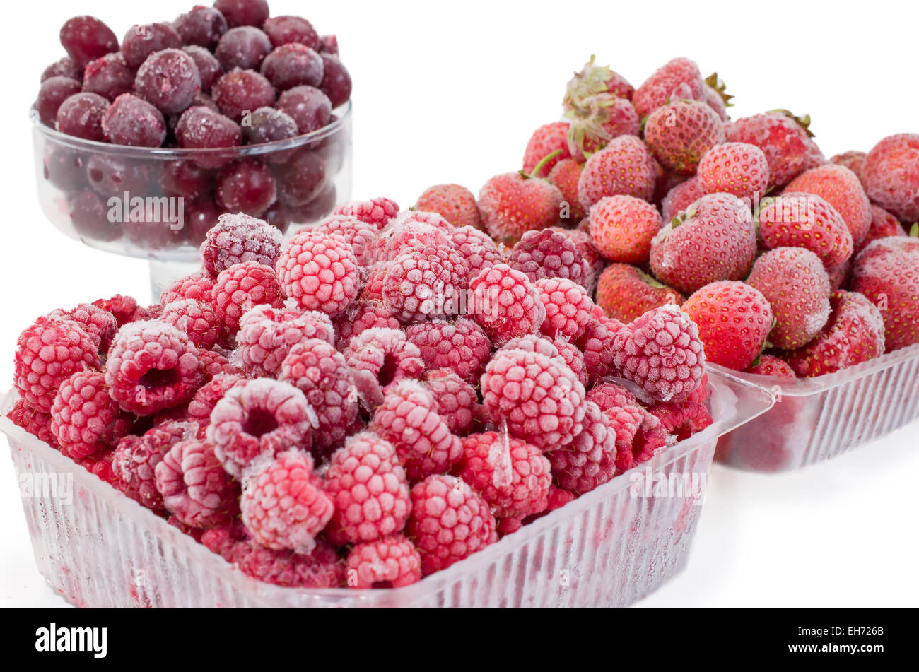 frozen strawberries, cherry and raspberries. Selective focus Stock ...