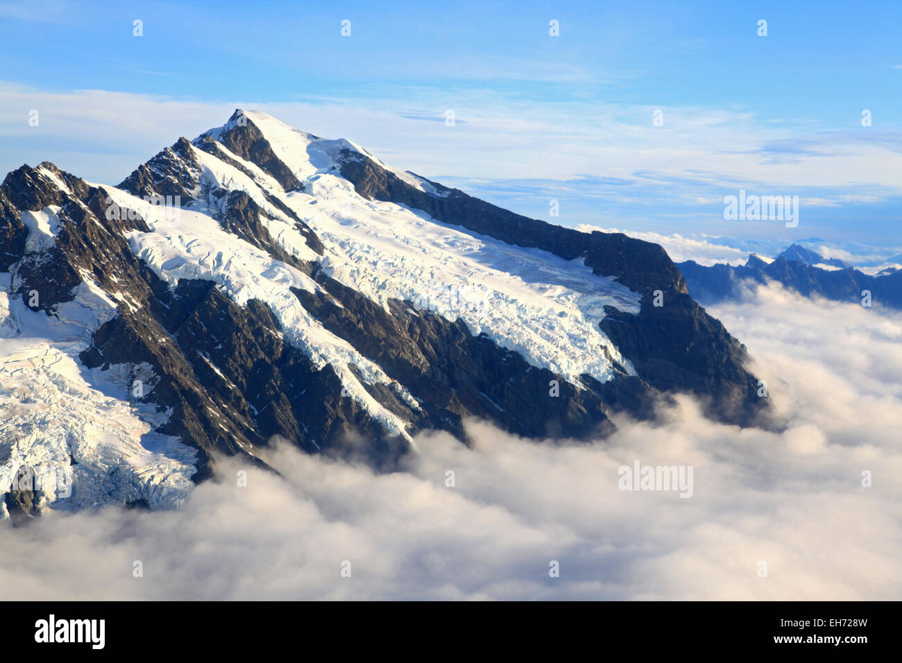 landscape of Mount cook with sea of mist from helicopter Stock Photo ...