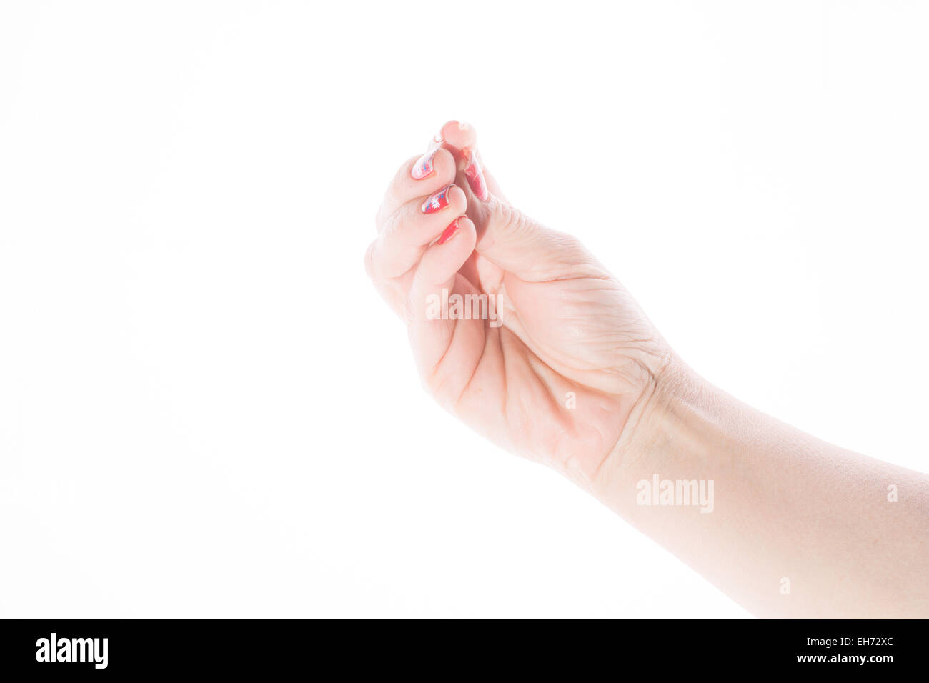 Female hand showing sign tasty white background Stock Photo - Alamy