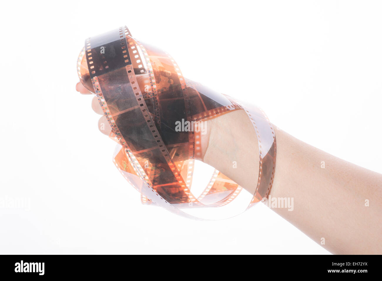 Old photographic film in the hand on white background Stock Photo - Alamy