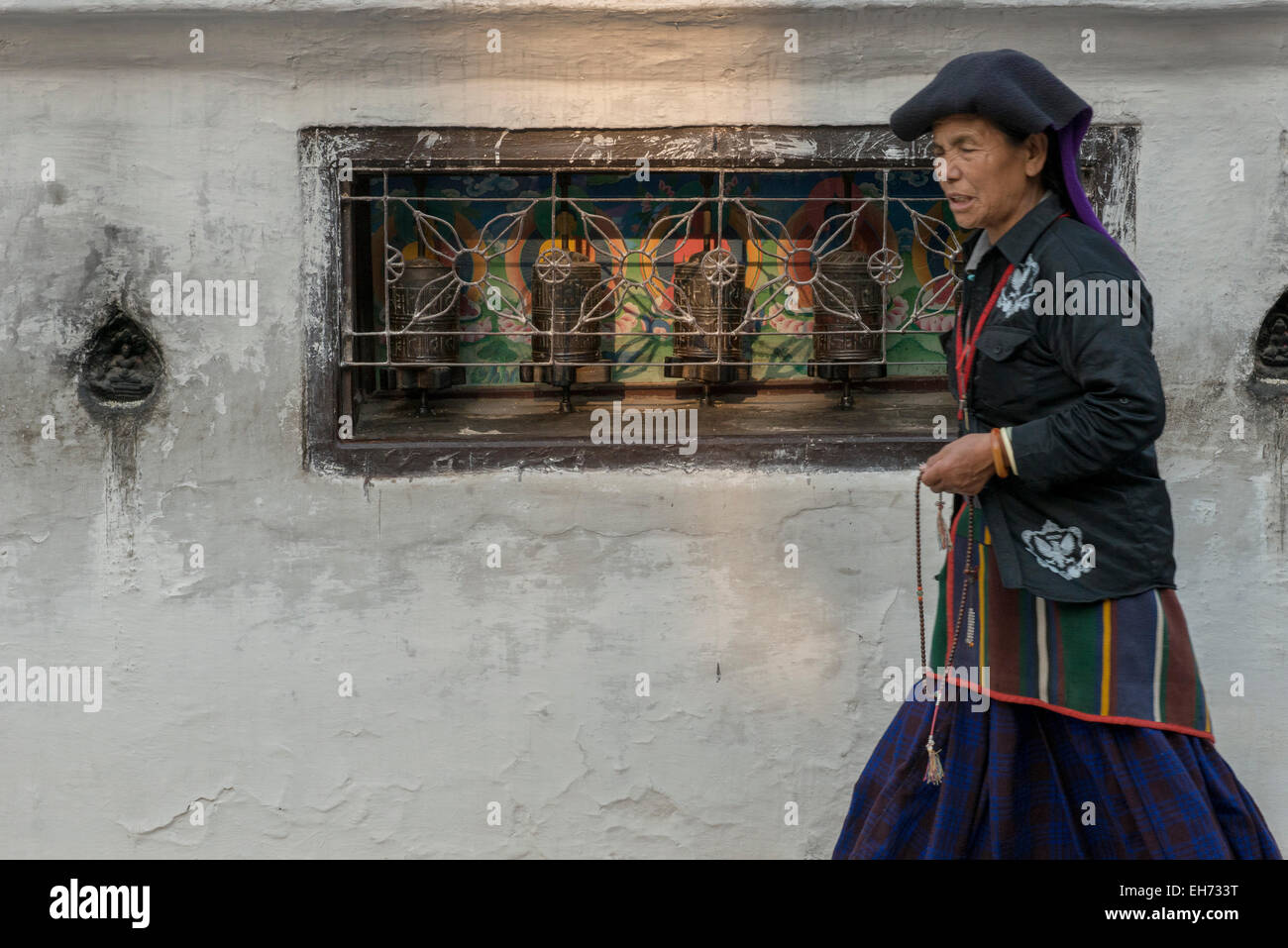Female Pilgrim Circumambulating Around Bodhnath Stupa, Kathmandu Stock ...