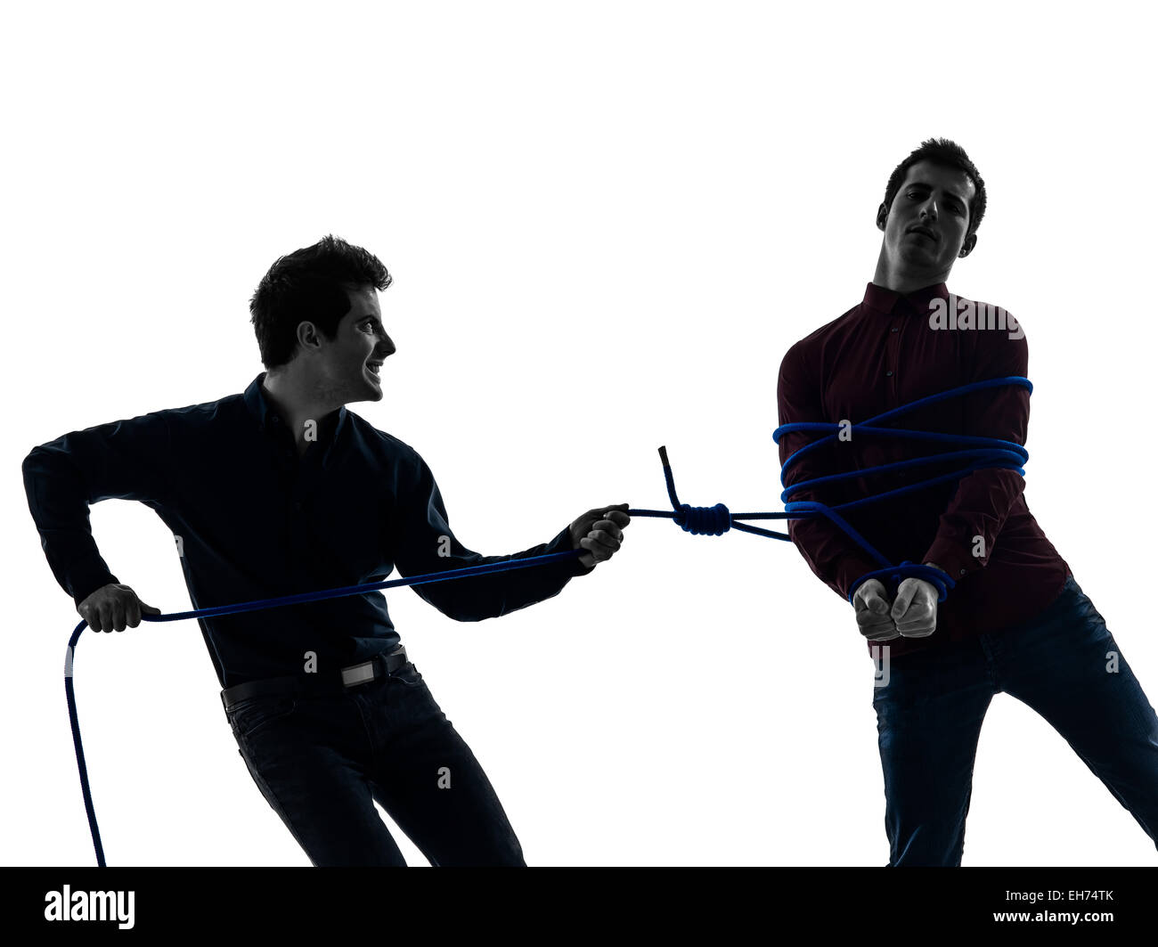 Silhouette two young men hi-res stock photography and images - Alamy