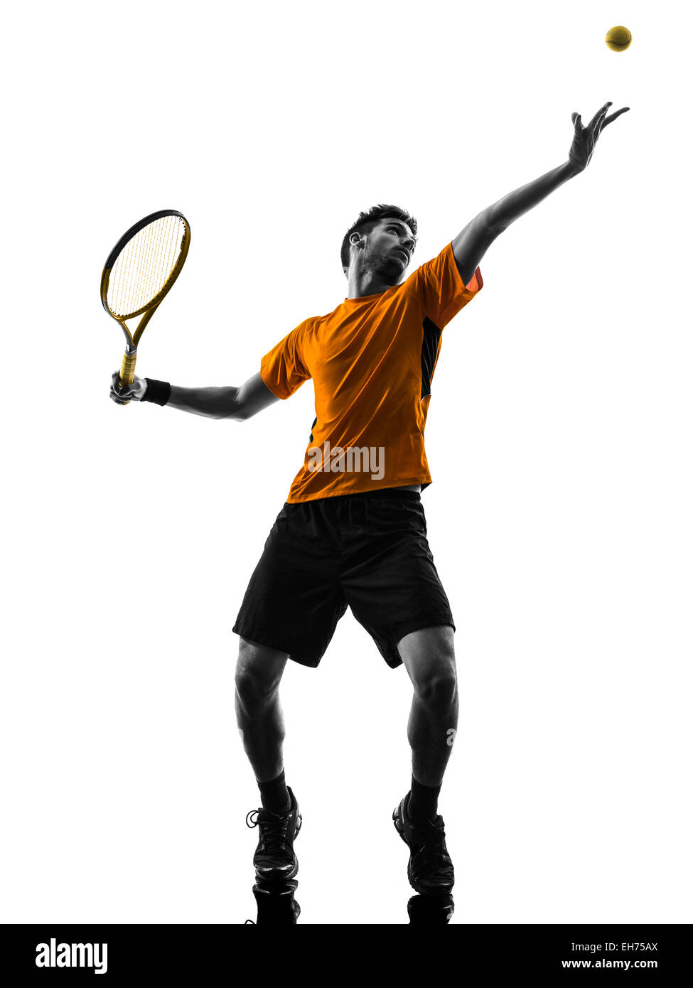 one man tennis player at service serving silhouette in silhouette on ...