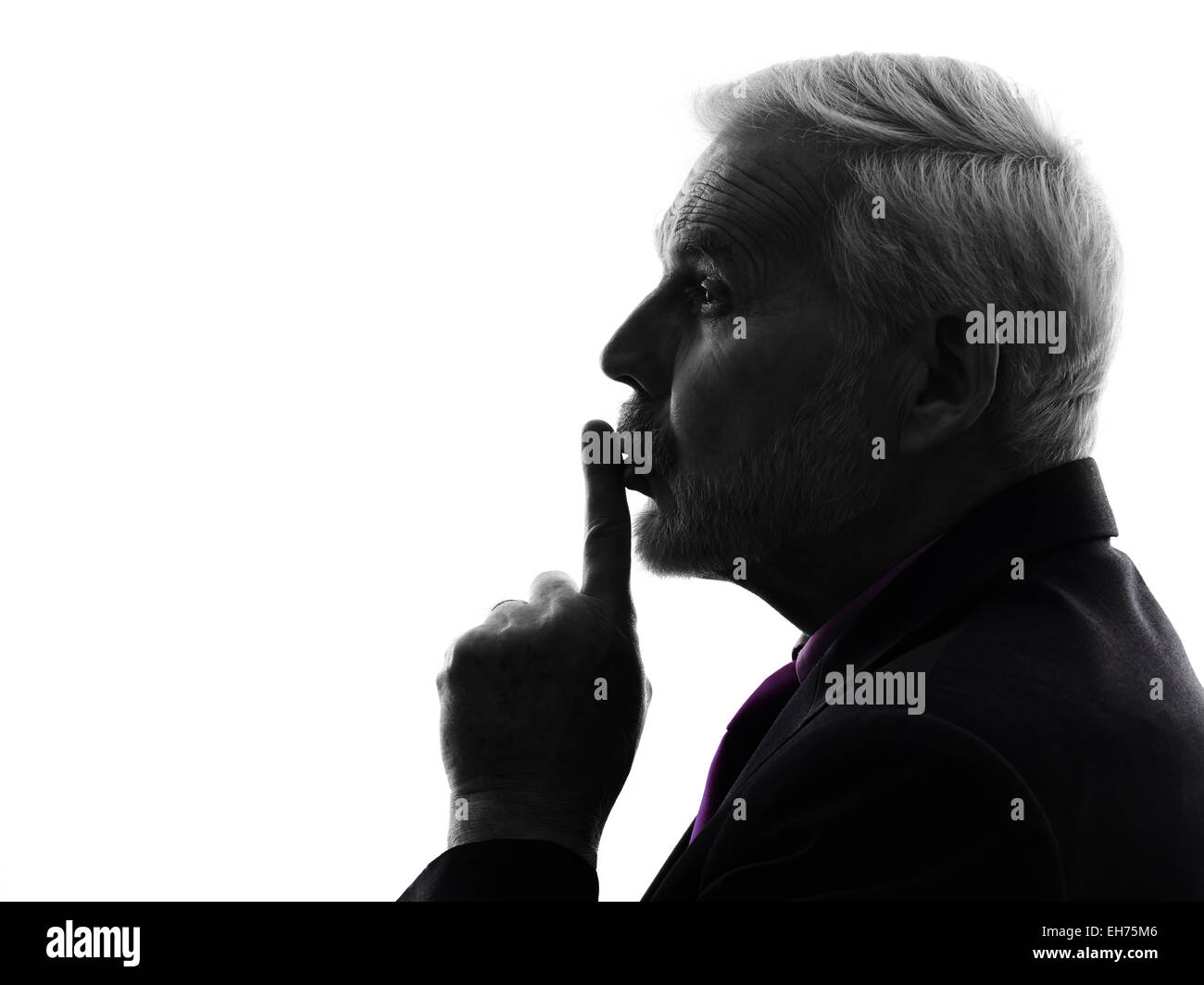 One Caucasian Senior Business Man hushing finger on lips Silhouette ...