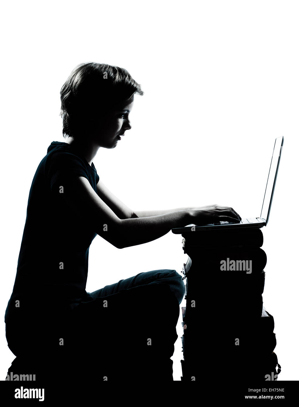 Child using laptop silhouette hi-res stock photography and images - Alamy