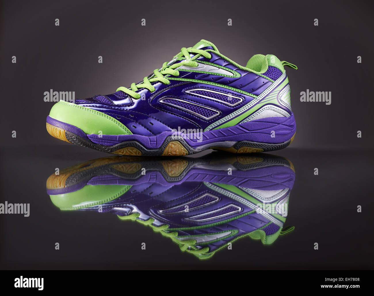A side view of sport shoes with reflected surface Stock Photo - Alamy