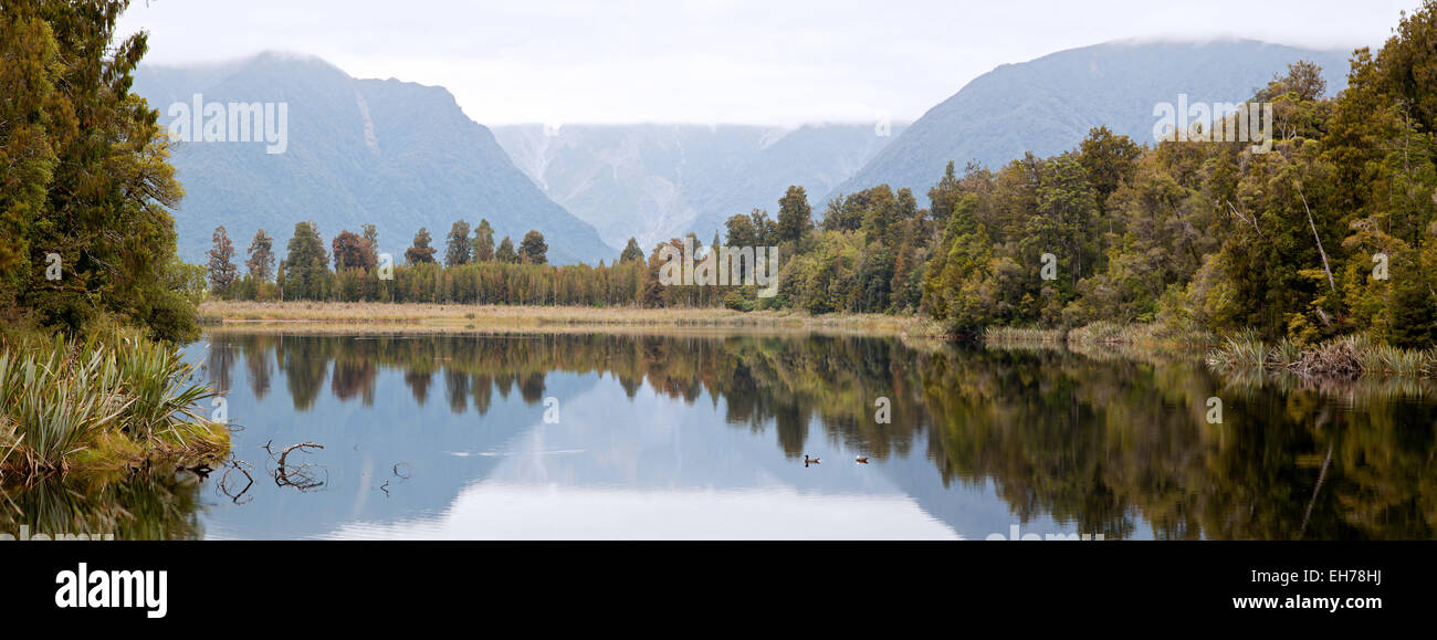 Panorama Landscape Mount cook at Lake Matheson with cloudy sky New ...