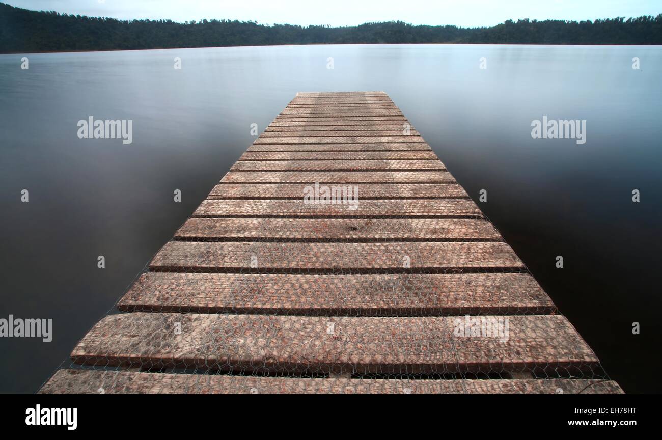 the old jetty walkway pier the the lake Stock Photo - Alamy