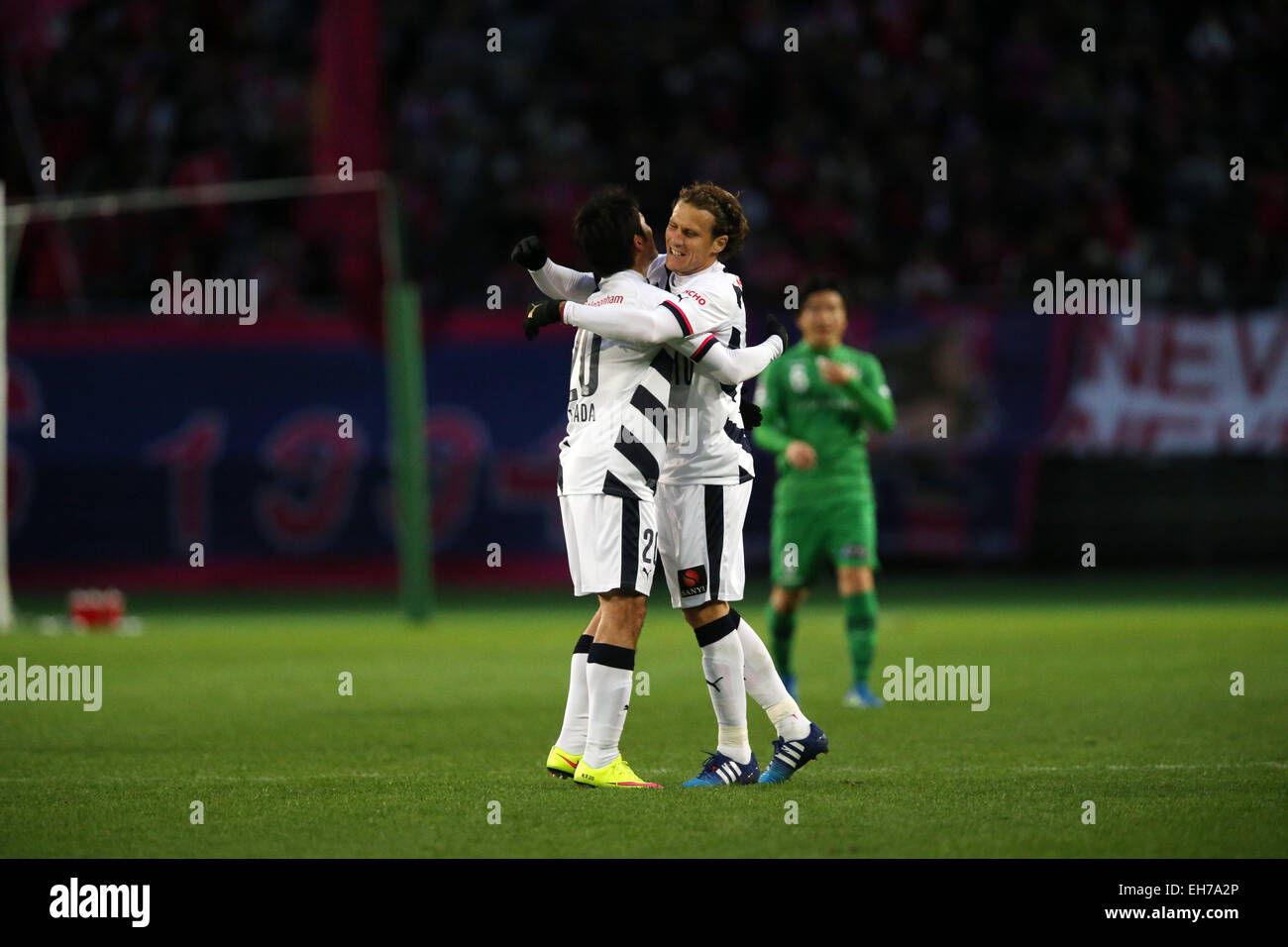 Tokyo, Japan. 8th Mar, 2015. (L to R) Keiji Tamada (Cerezo), Forlan ...