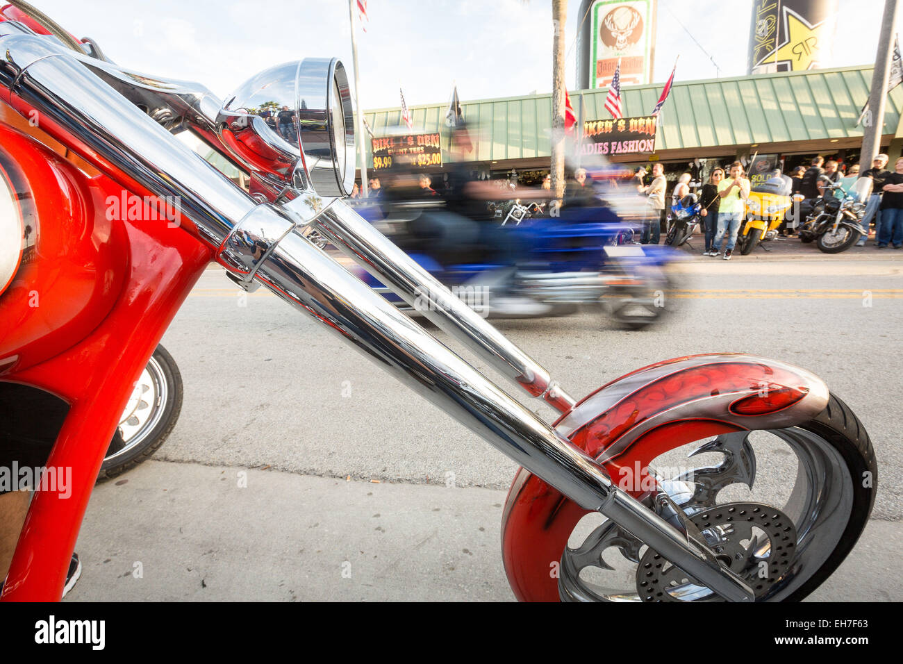 Daytona Beach, FL, USA. 8th Mar, 2015. Bikers ride past a custom ...